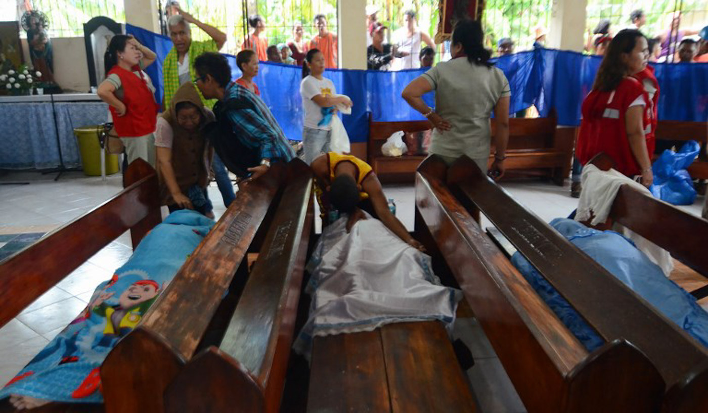 IN PHOTOS: Rescuers dig for survivors in Naga, Cebu, landslide IN PHOTOS: Rescuers dig for survivors in Naga, Cebu, landslide